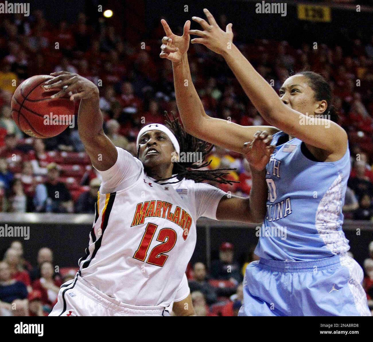 Maryland center Lynetta Kizer (12) grabs a rebound in front of North ...