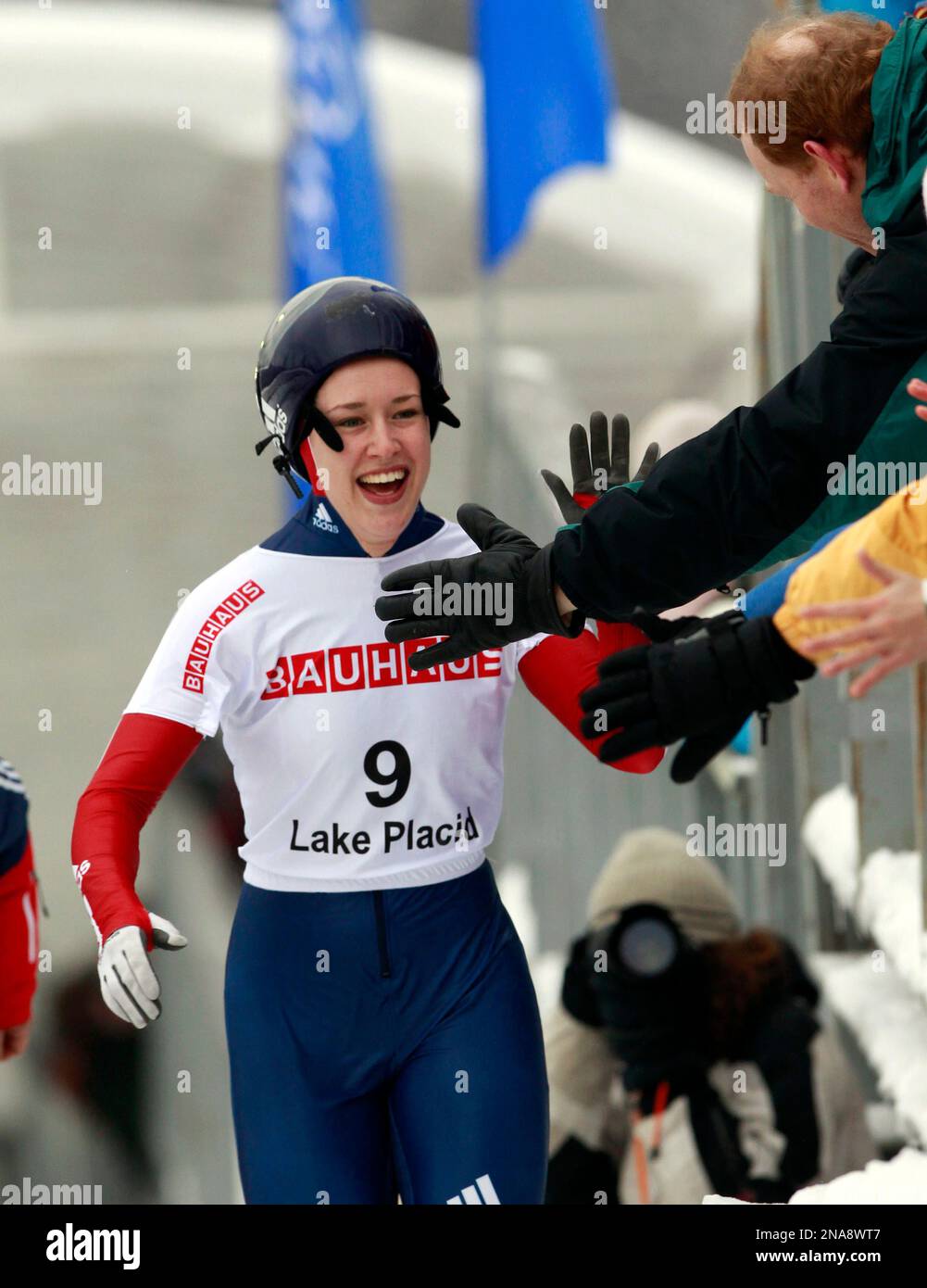 Great Britain's Elizabeth Yarnold reacts after her third-place finish ...