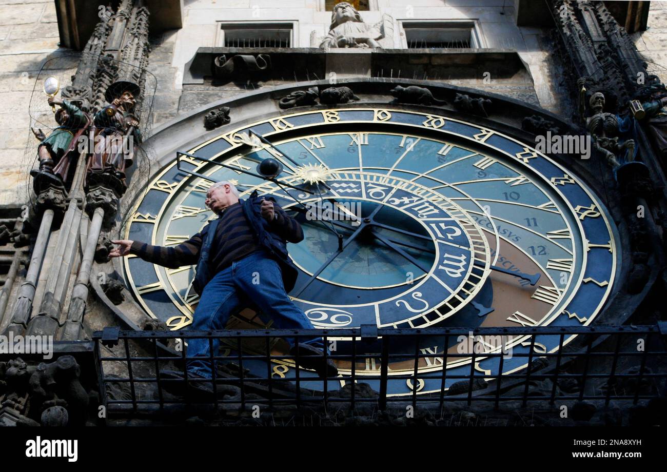 Petr Skala walks on a ledge during his weekly maintenance of the famous ...