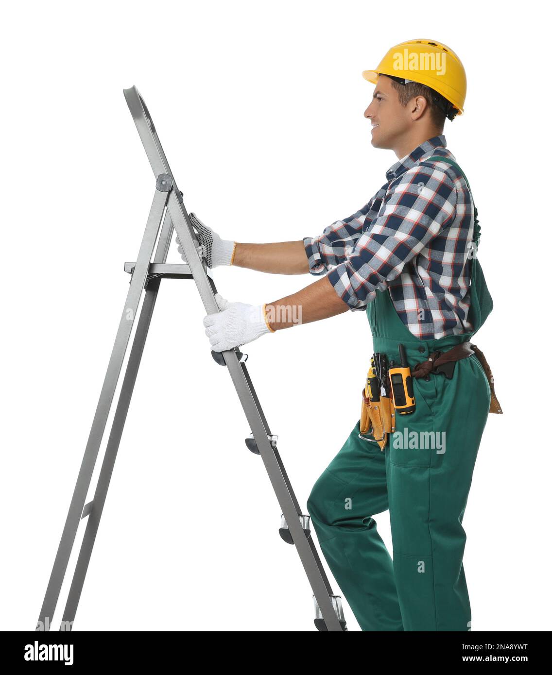 Professional builder climbing up metal ladder on white background Stock ...