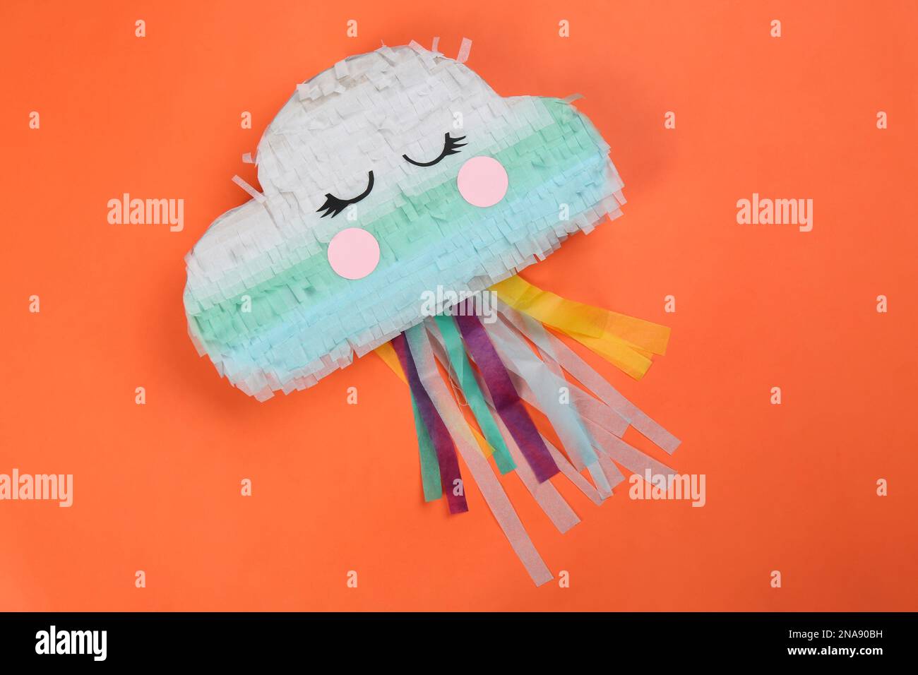 Orange candy pinata hi-res stock photography and images - Alamy