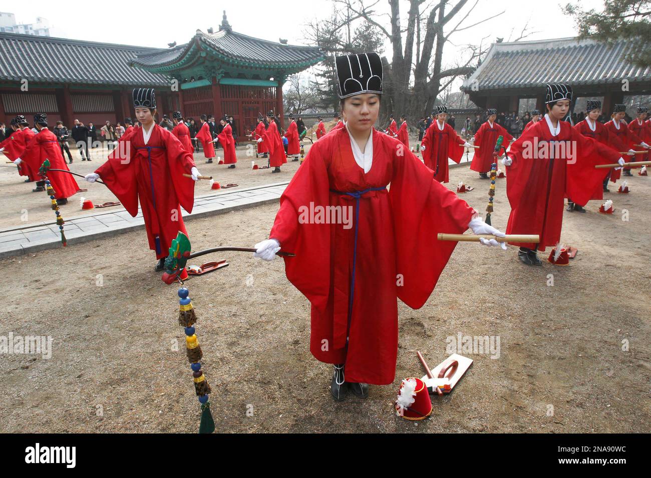 South Korean students wearing traditional Korean costumes perform ...