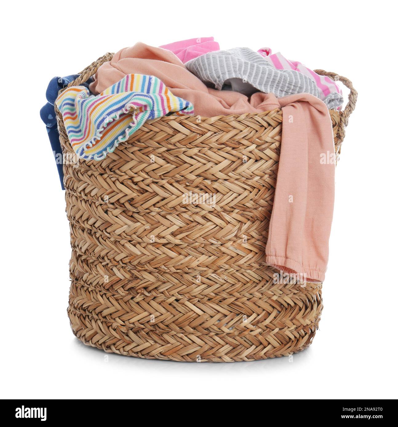 Wicker laundry basket with clothes isolated on white Stock Photo - Alamy