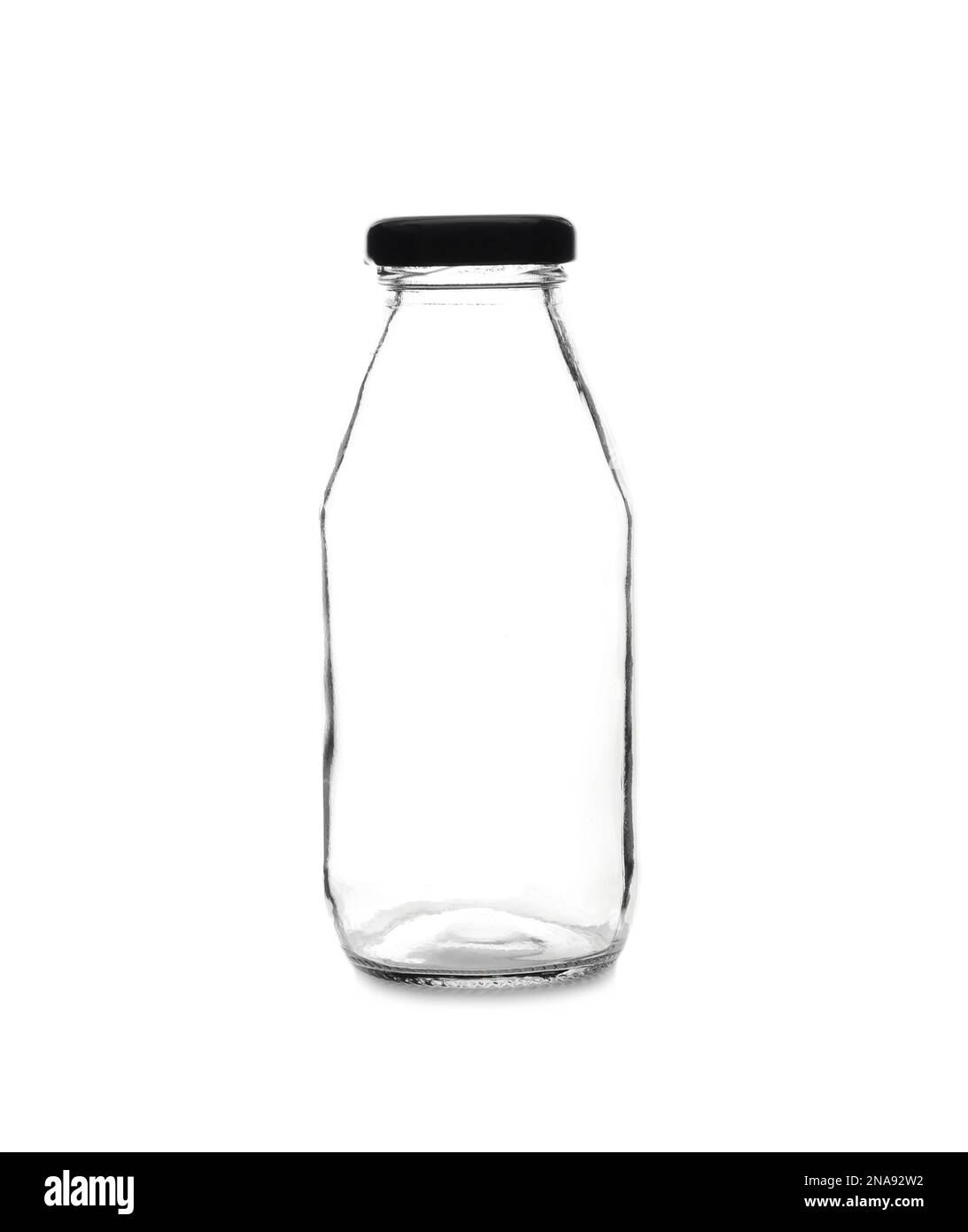 Closed empty glass bottle isolated on white Stock Photo - Alamy