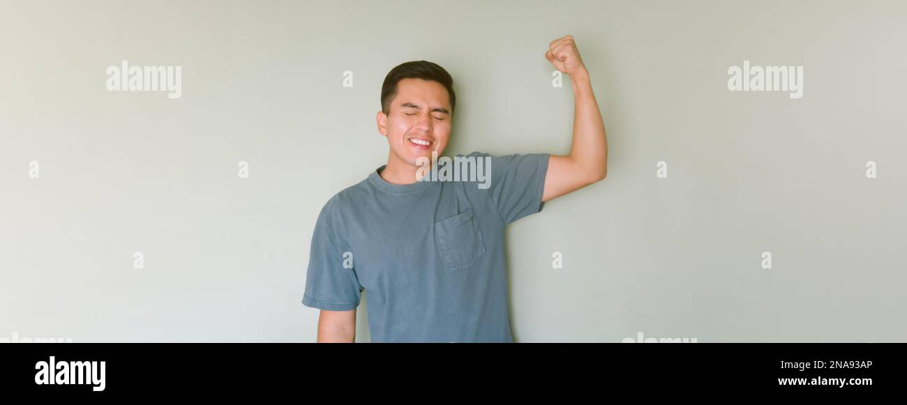 A Happy normal complexion man showing his strength with happiness Stock ...