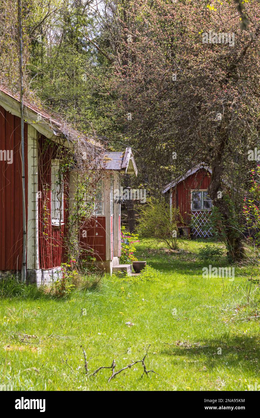 Idyllic red cottage porch hi-res stock photography and images - Alamy