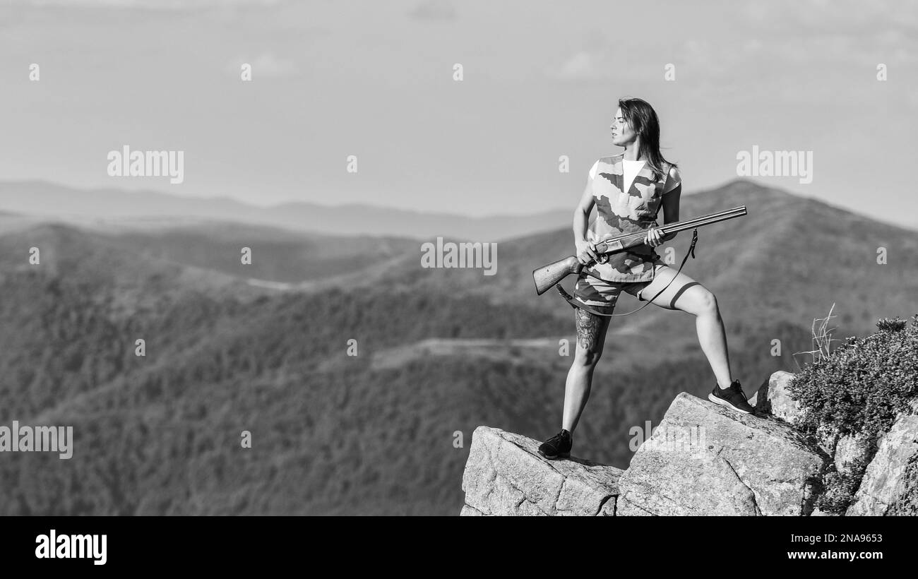 Army forces. Woman military outfit hold weapon highlands background ...