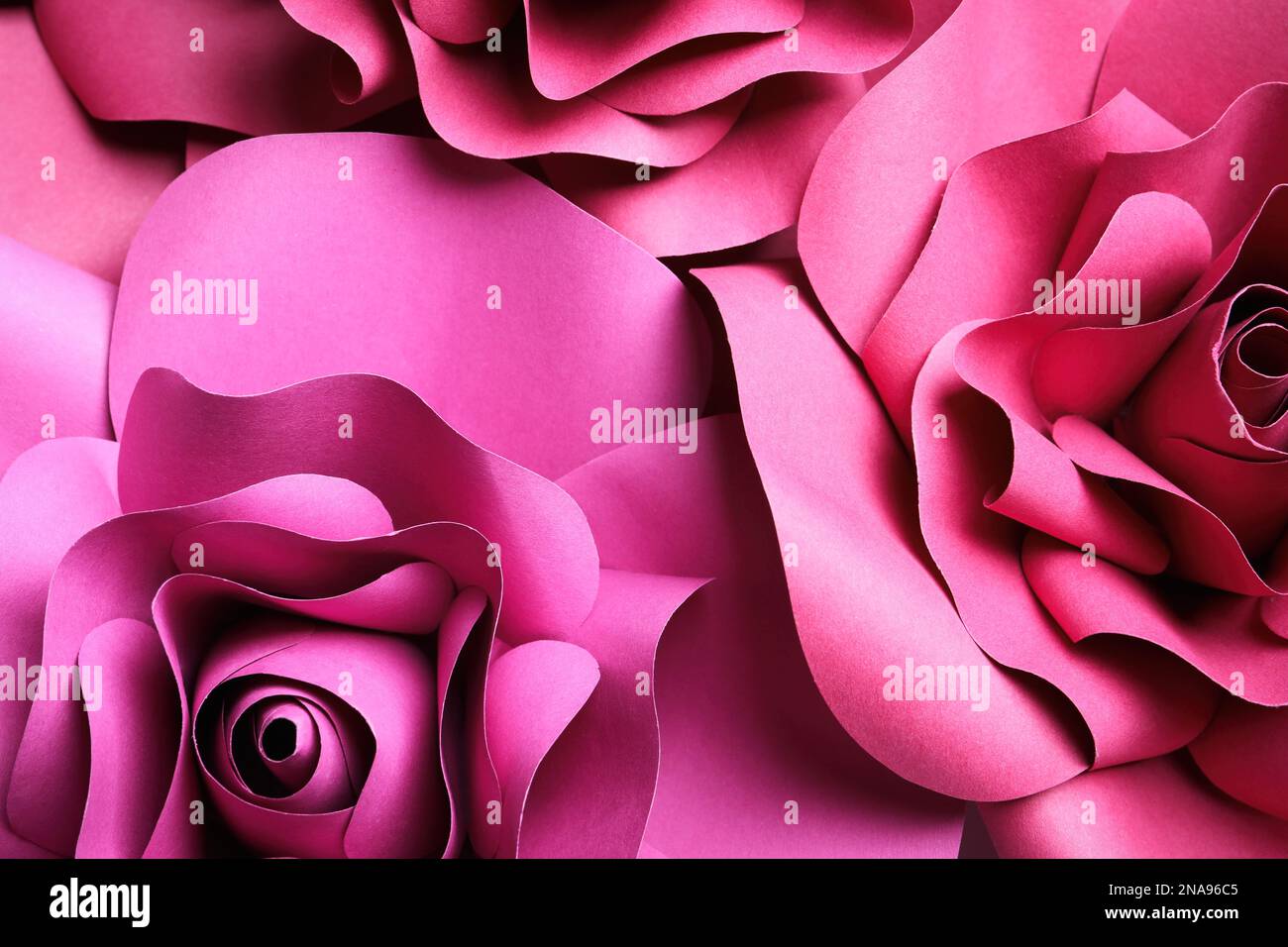 Beautiful flowers made of paper as background, top view Stock Photo - Alamy