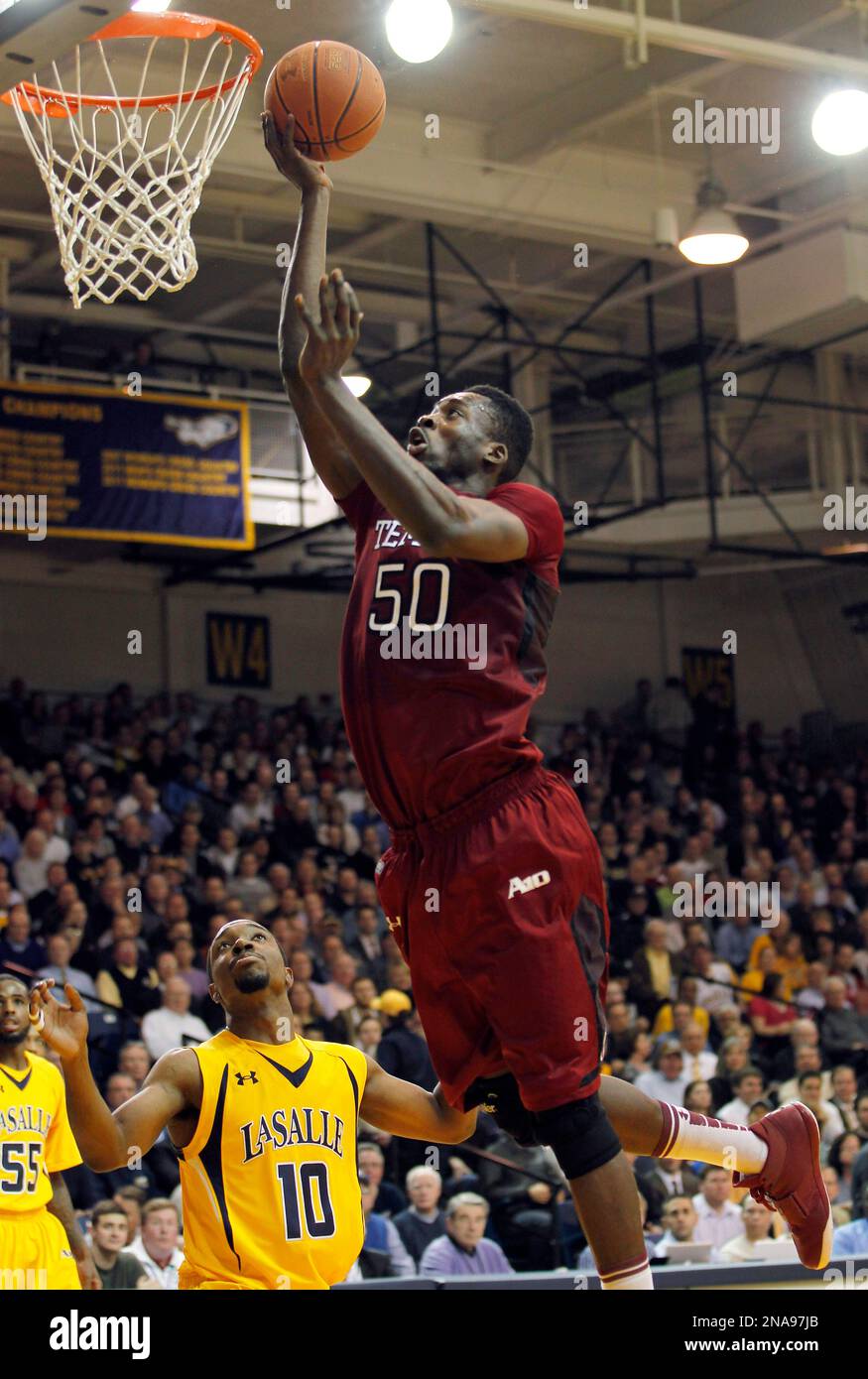 Temple's Micheal Eric (50) shoots over La Salle guard Sam Mills (10 ...