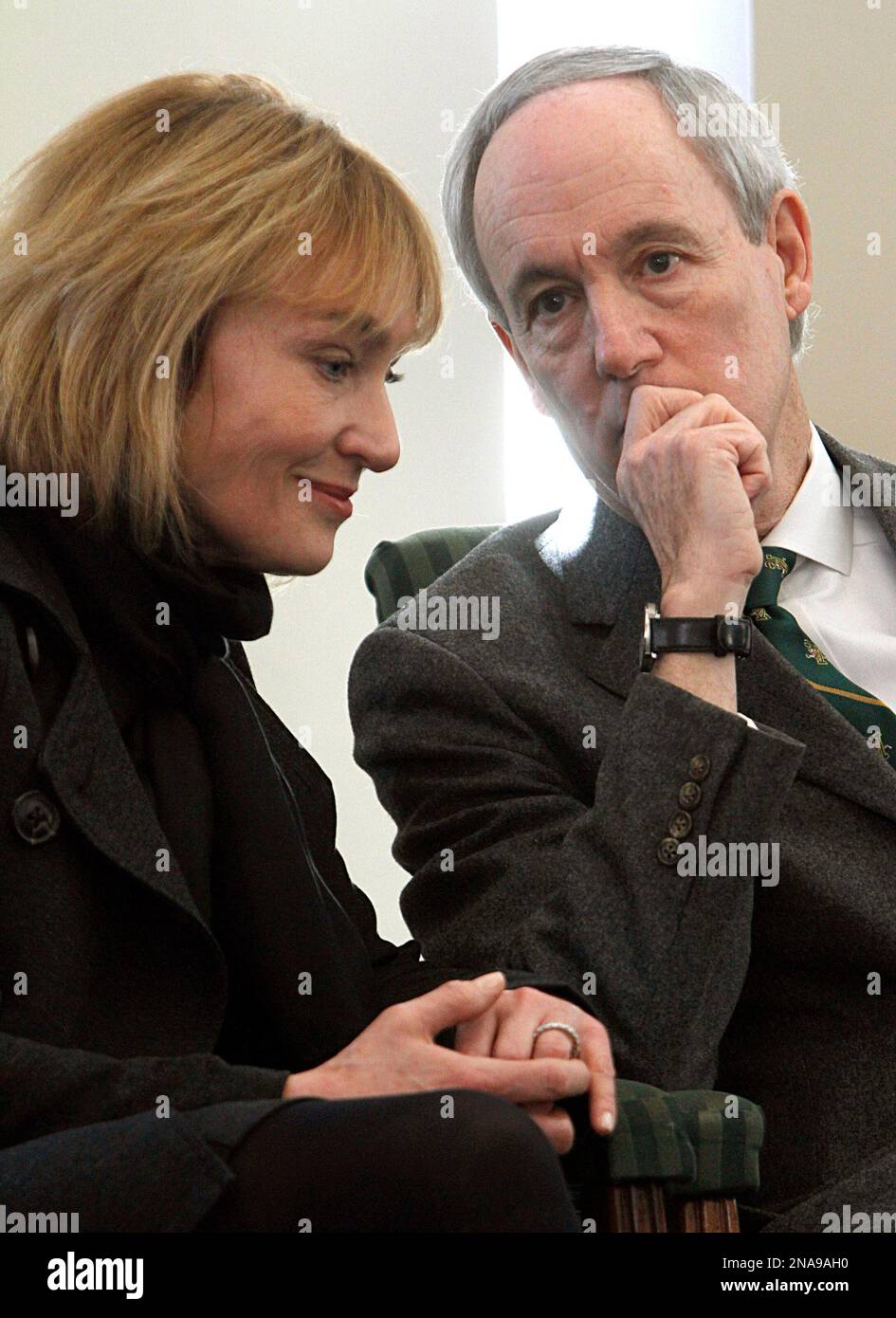 E. Thomas Sullivan, right, confers with his wife, Leslie, during an ...