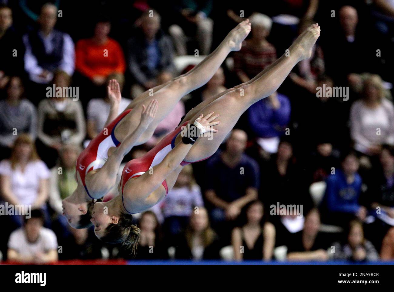Amy Cozad and Laura Ryan from the U.S. perform a dive during the ...