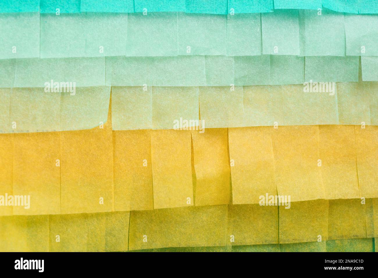 Cut tissue paper in different colors as background Stock Photo - Alamy