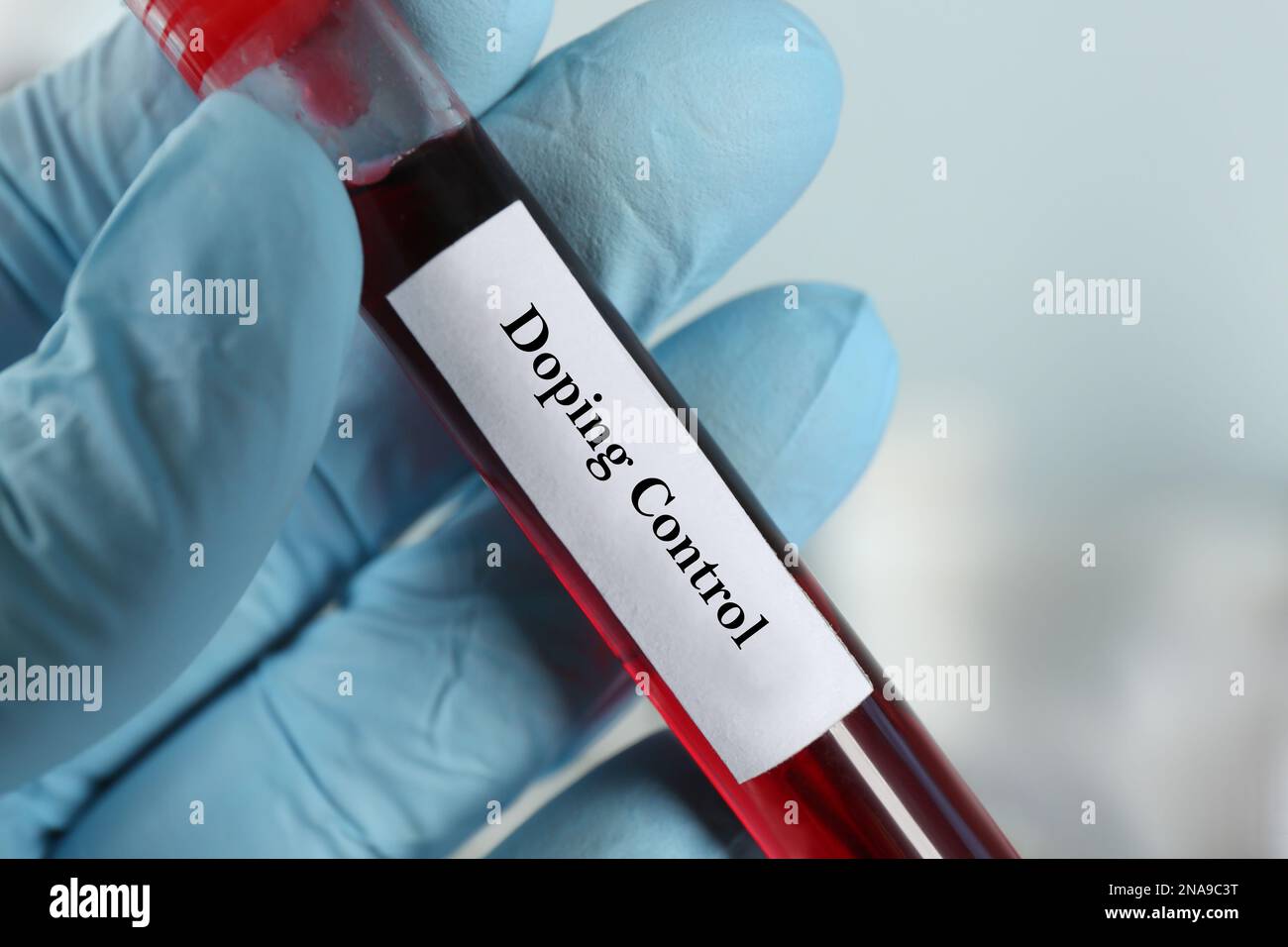 Doctor holding test tube with sample, closeup. Doping control Stock ...