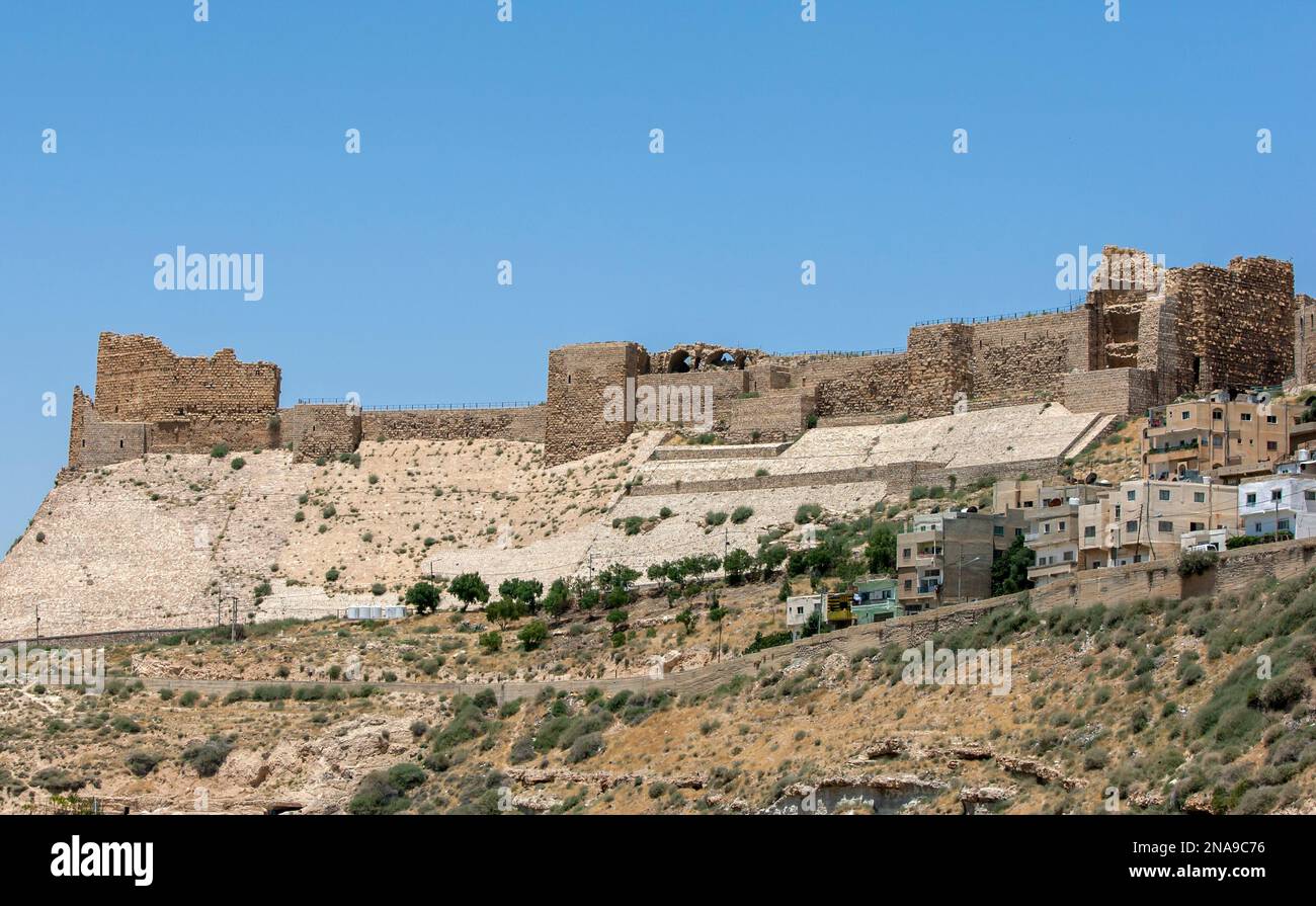 The ruins of the 12th century Kerak Castle which sits on a ridge above ...