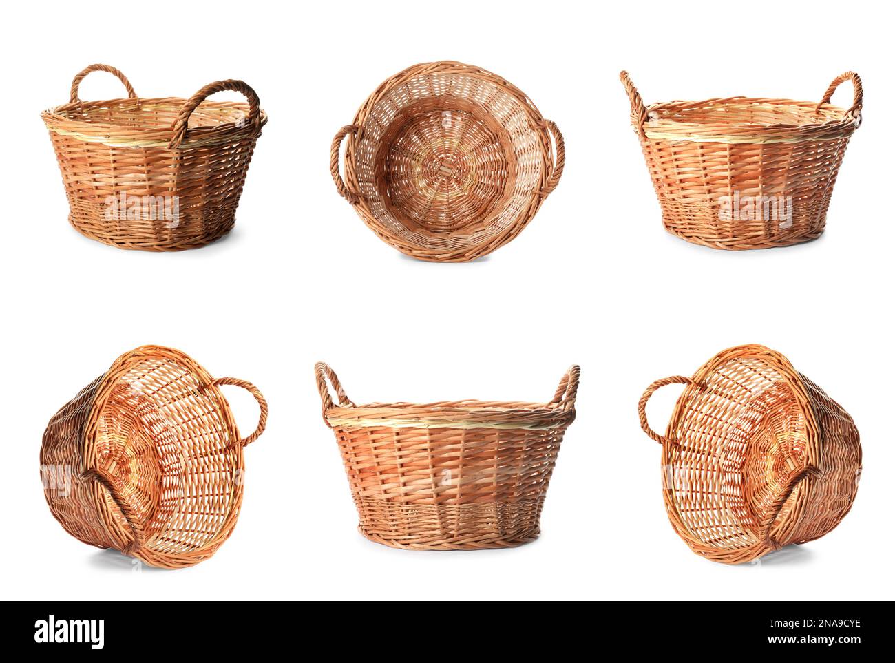 Set with wicker baskets on white background Stock Photo - Alamy