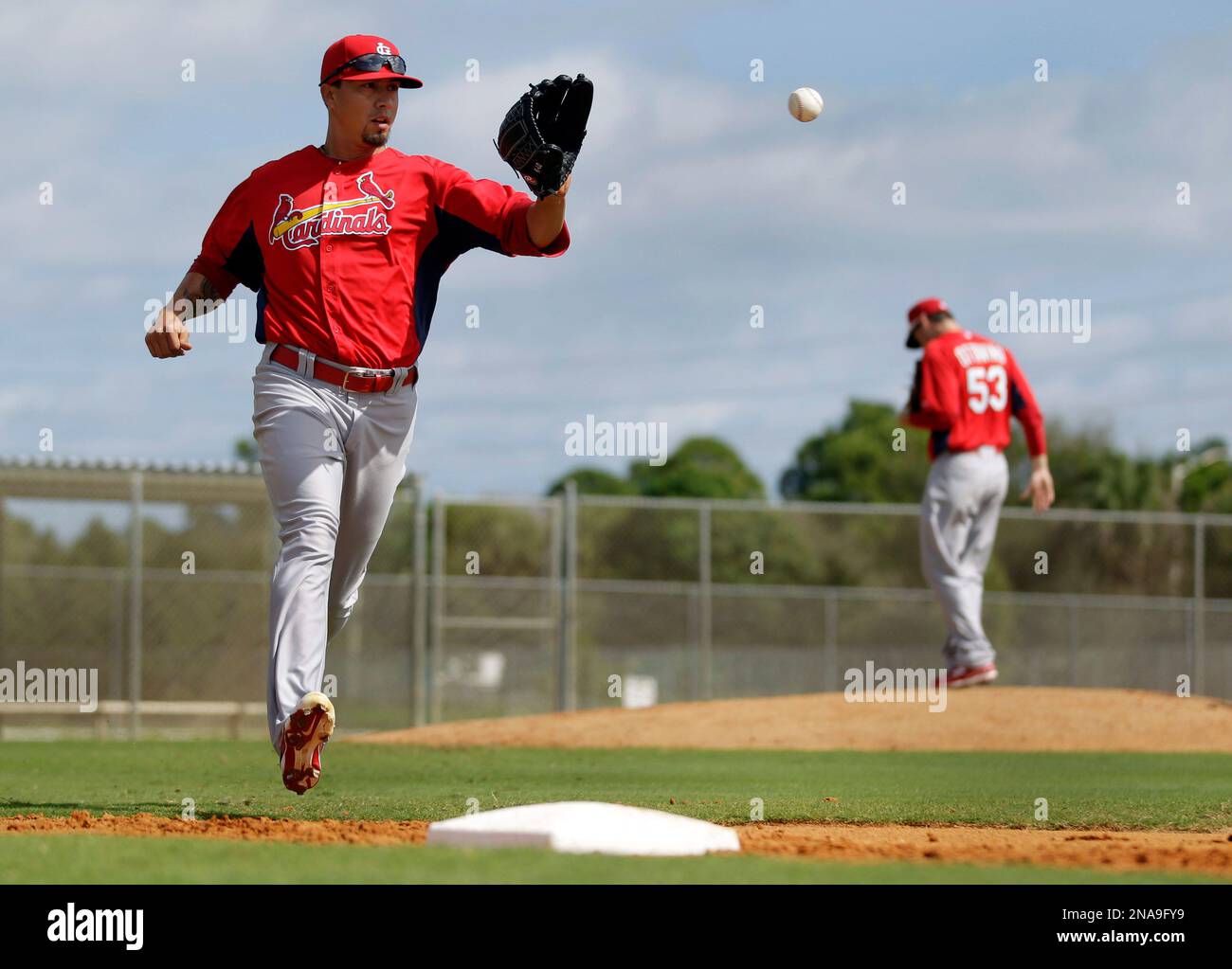 St. Louis Cardinals pitcher Kyle Lohse, left, covers first during a ...