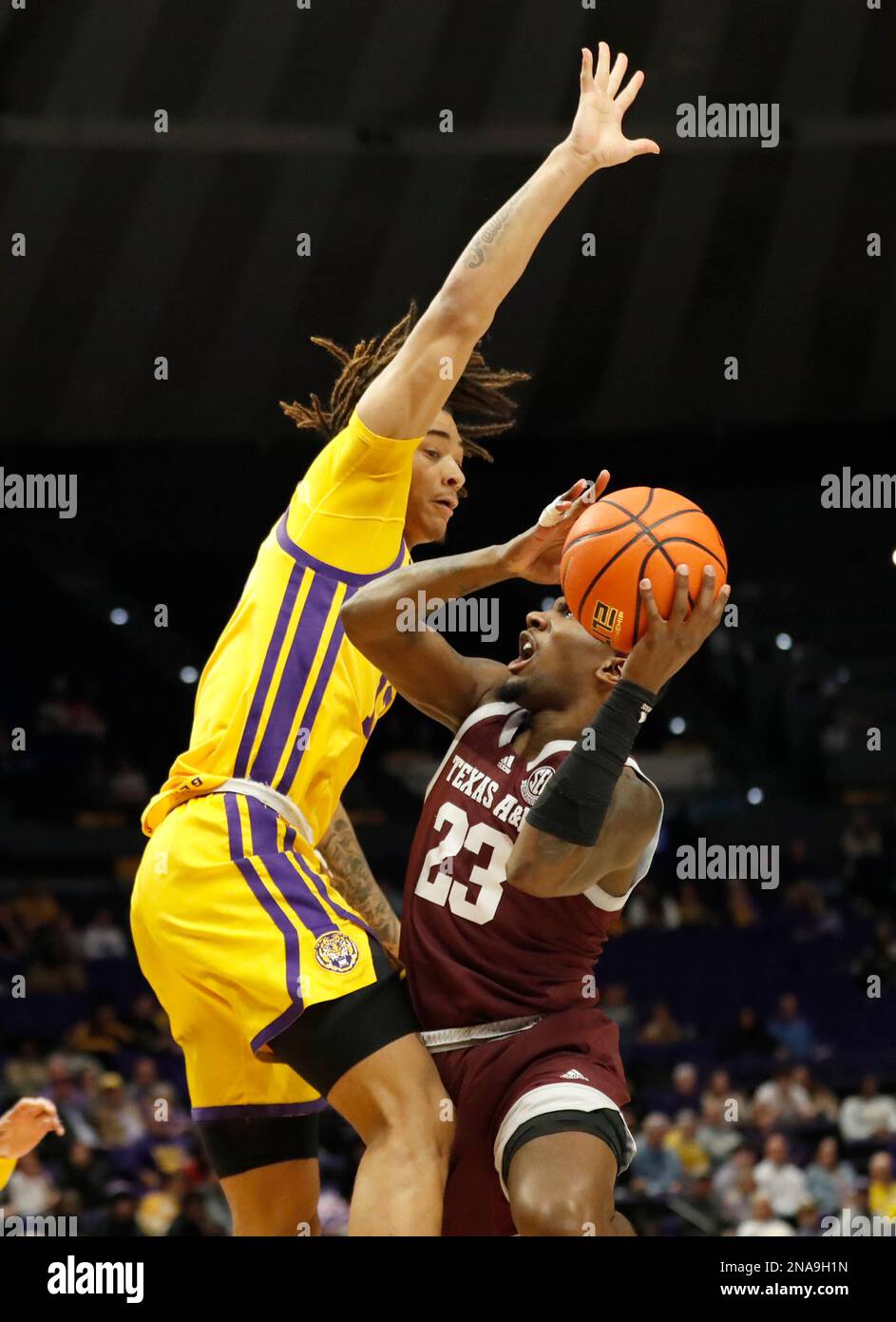 LSU Tigers forward Jalen Reed (13) tries to block Texas A&M Aggies ...
