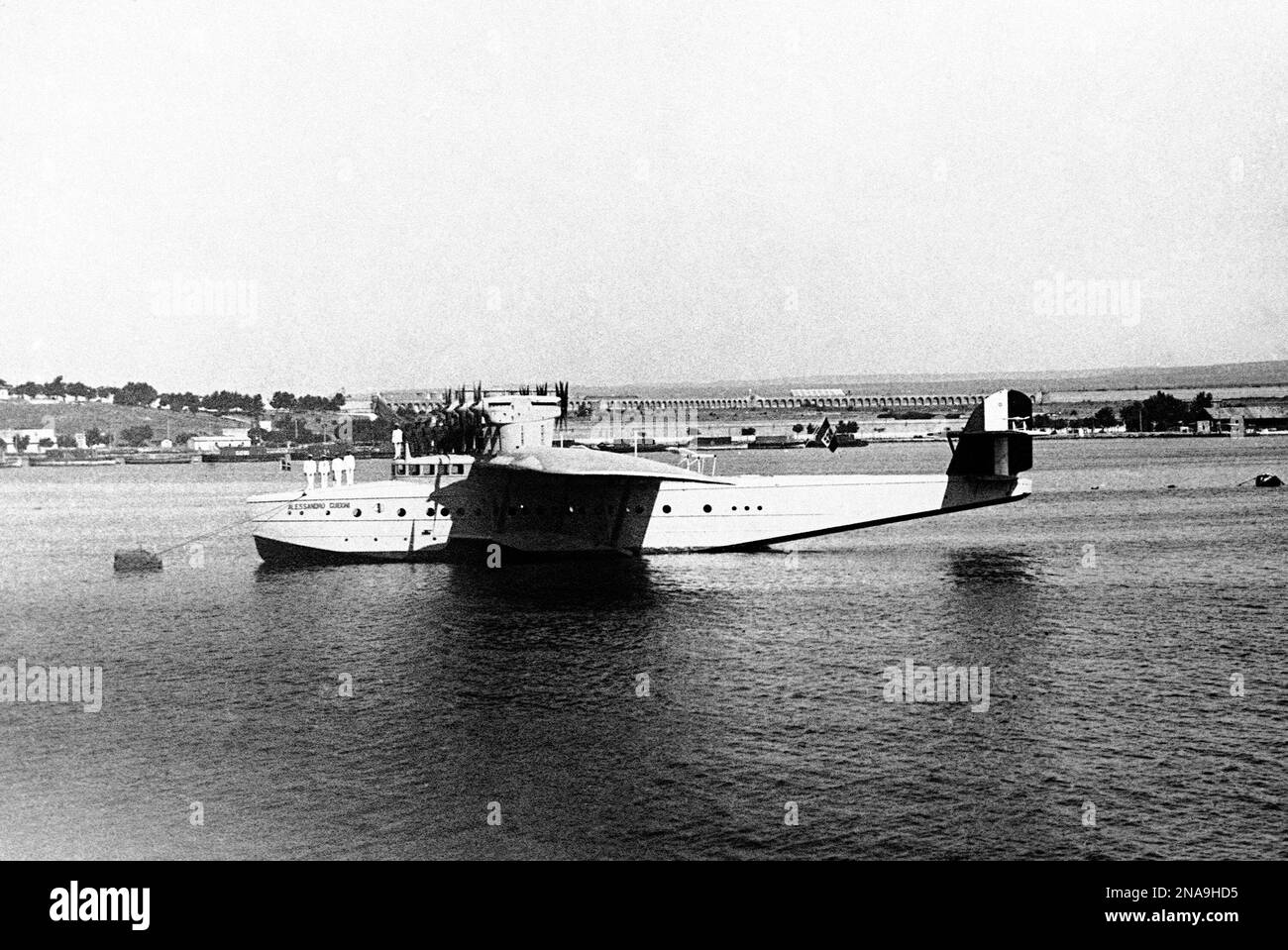 The giant Italian seaplane Alessandro Guidoni, with her crew lined up ...