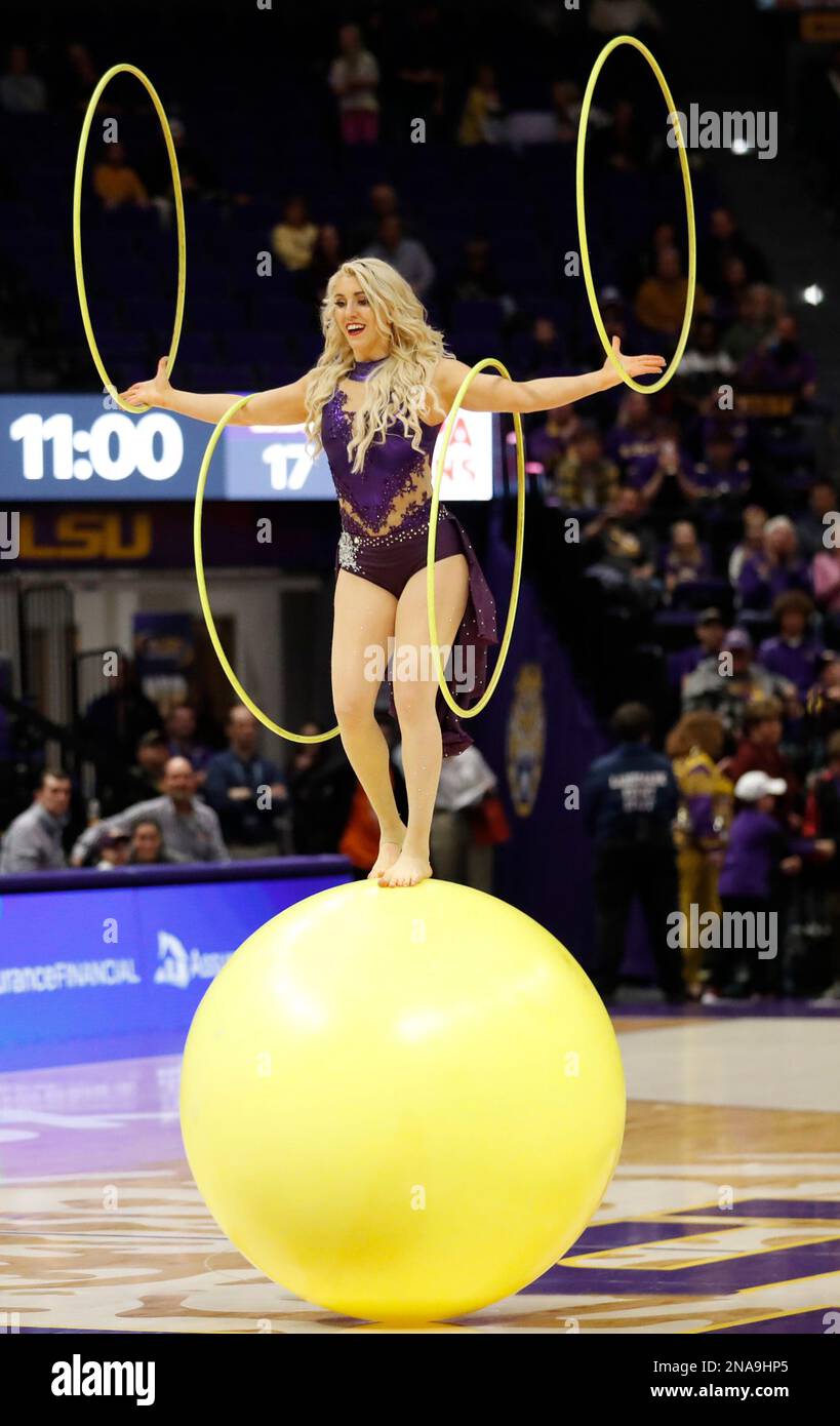 Cirque entertainment artist Grace Good performs during halftime of a ...