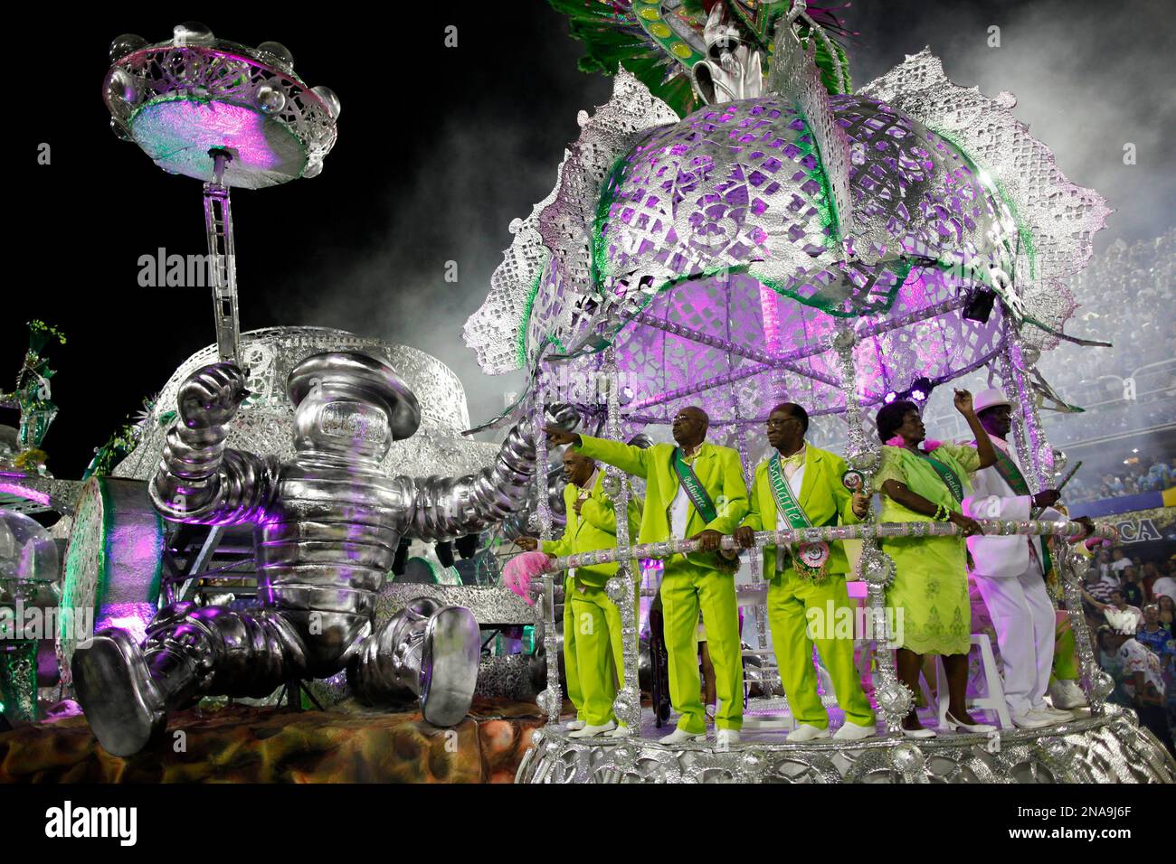 Dancers of Mangueira samba school parade on a float during carnival ...