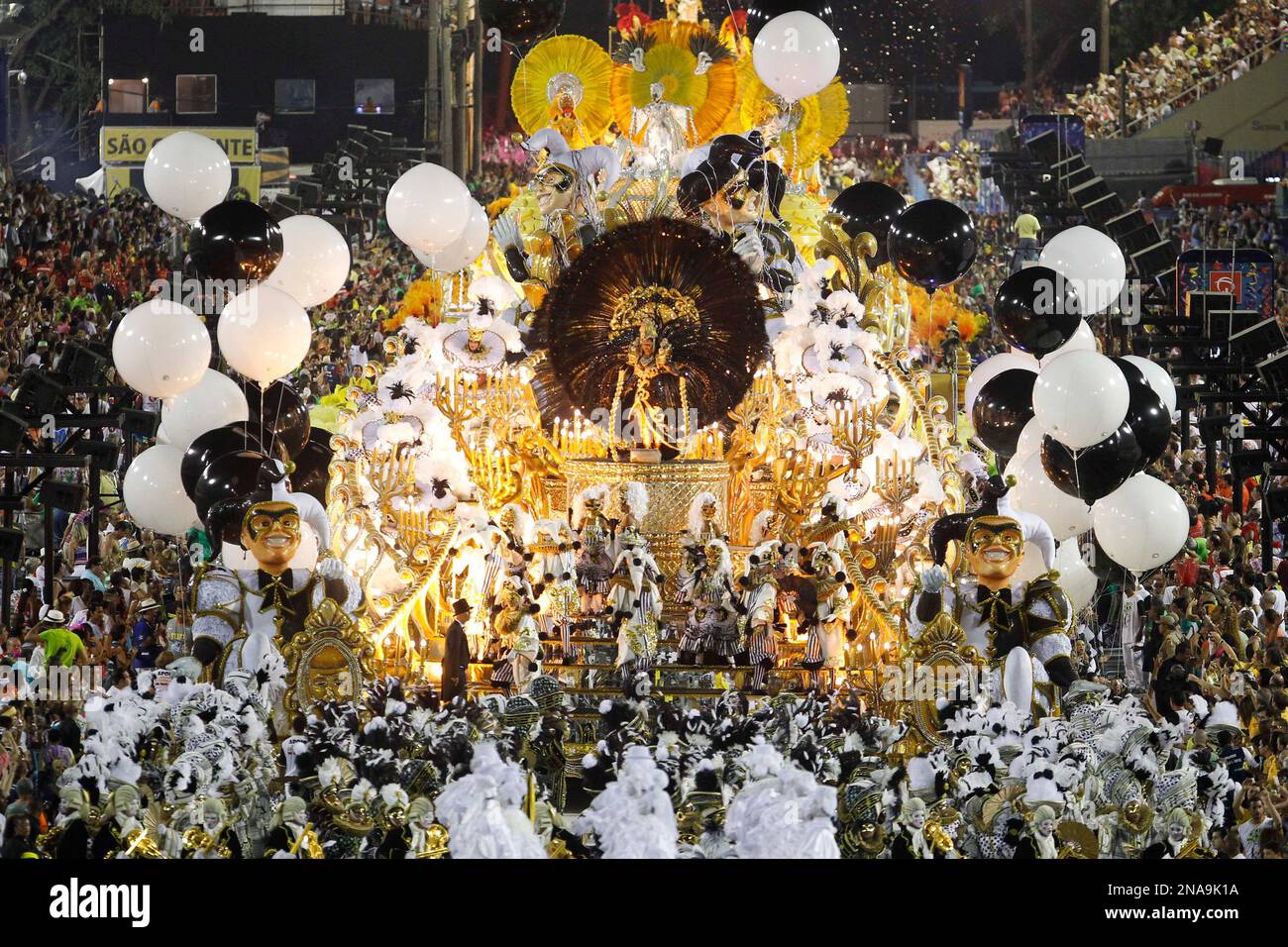 Dancers of Sao Clemente samba school parade on a float during carnival ...