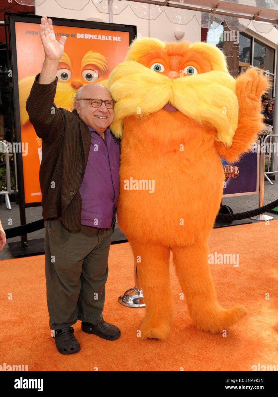 Actor Danny DeVito and The Lorax arrive at the premiere of the animated ...