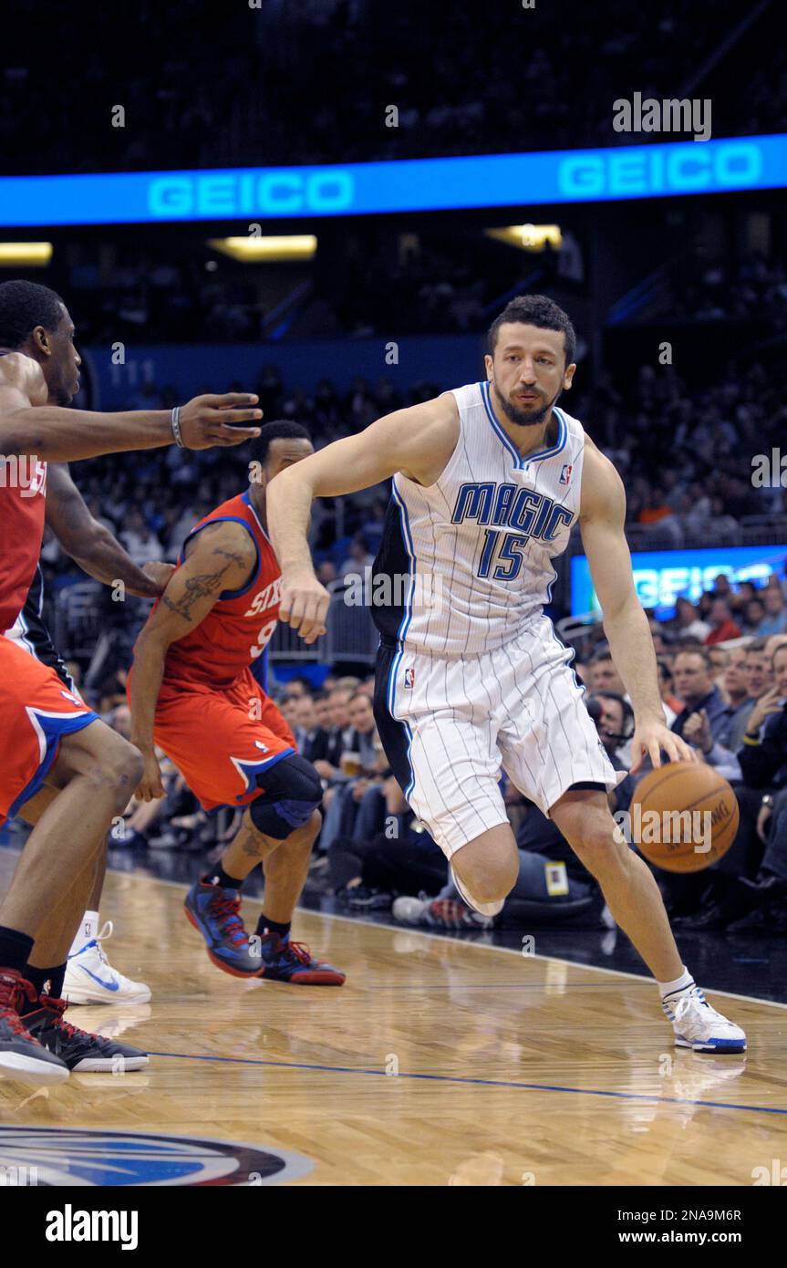 Orlando Magic forward Hedo Turkoglu, right, of Turkey, drives past ...