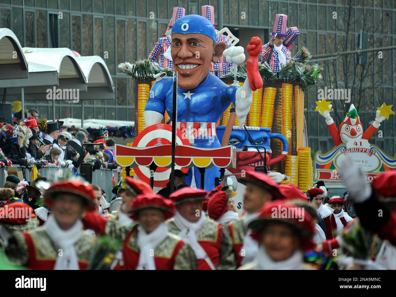 A carnival float depicts US President Barack Obama as Captain America ...