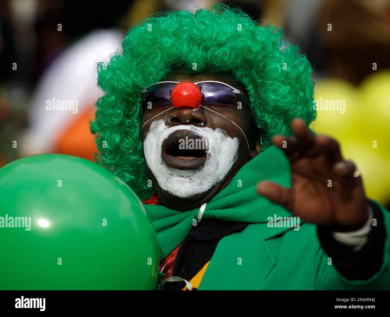 Revellers celebrate during the traditional carnival parade in ...