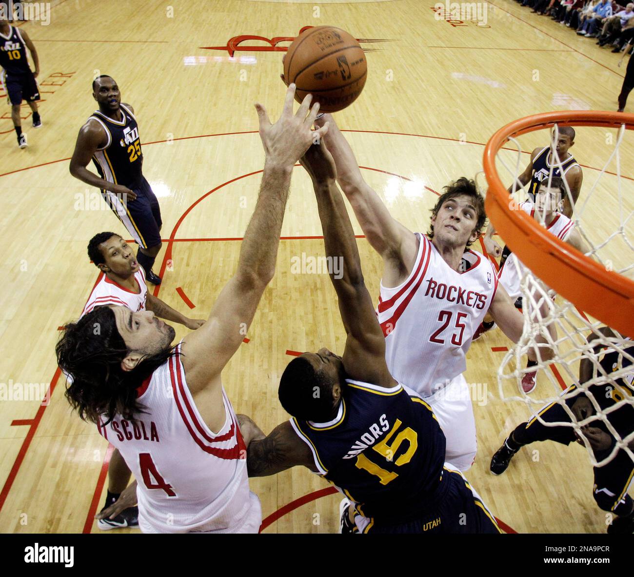 Houston Rockets' Chandler Parsons (25) and Luis Scola (4), of Argentina ...