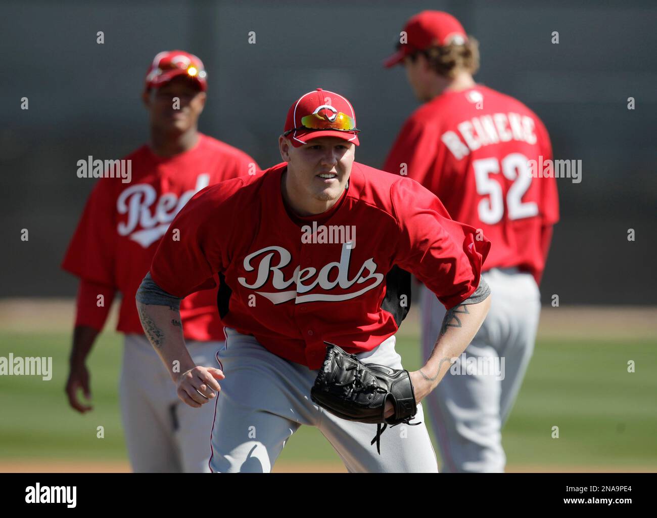 Cincinnati Reds pitcher Mat Latos throws during a spring training ...