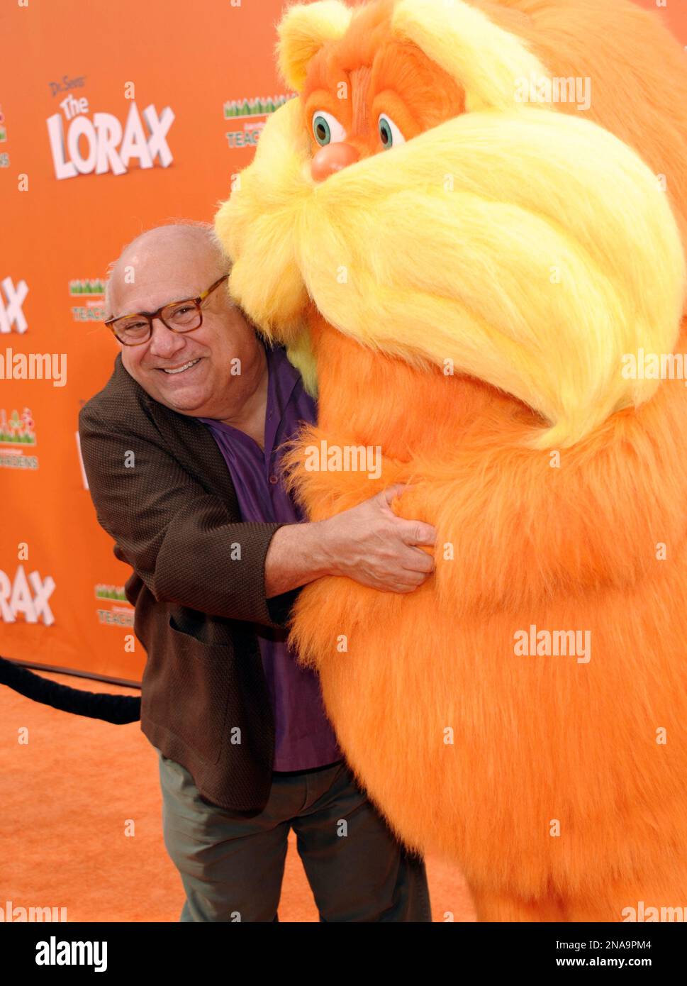 Actor Danny DeVito and The Lorax arrive at the premiere of the animated ...