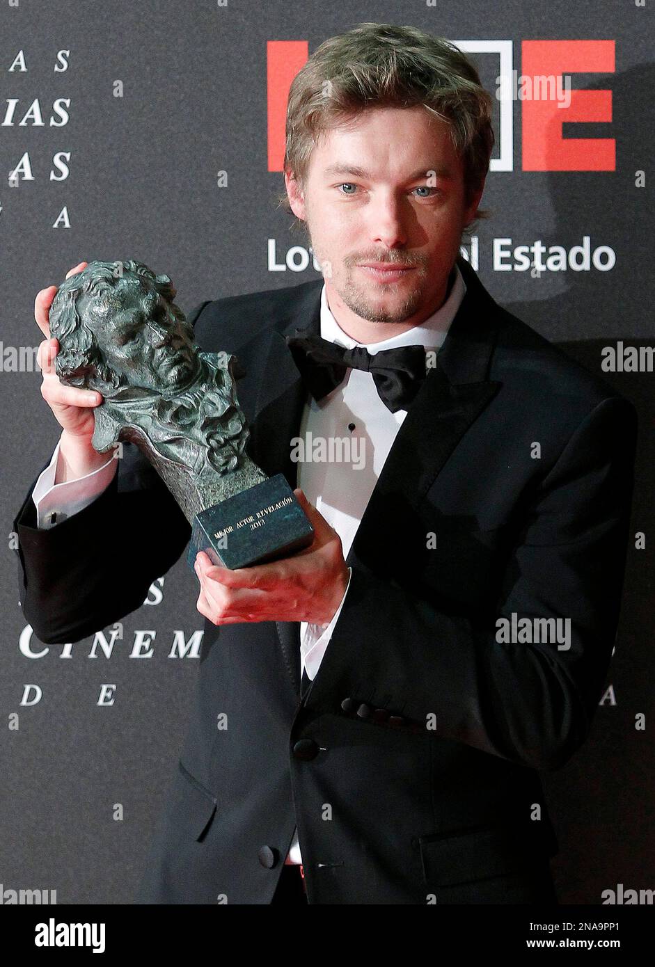 Spanish actor Jan Cornet holds his Goya trophy after winning in the ...