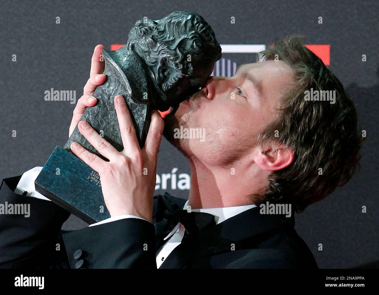 Spanish actor Jan Cornet kisses his Goya trophy after winning in the ...