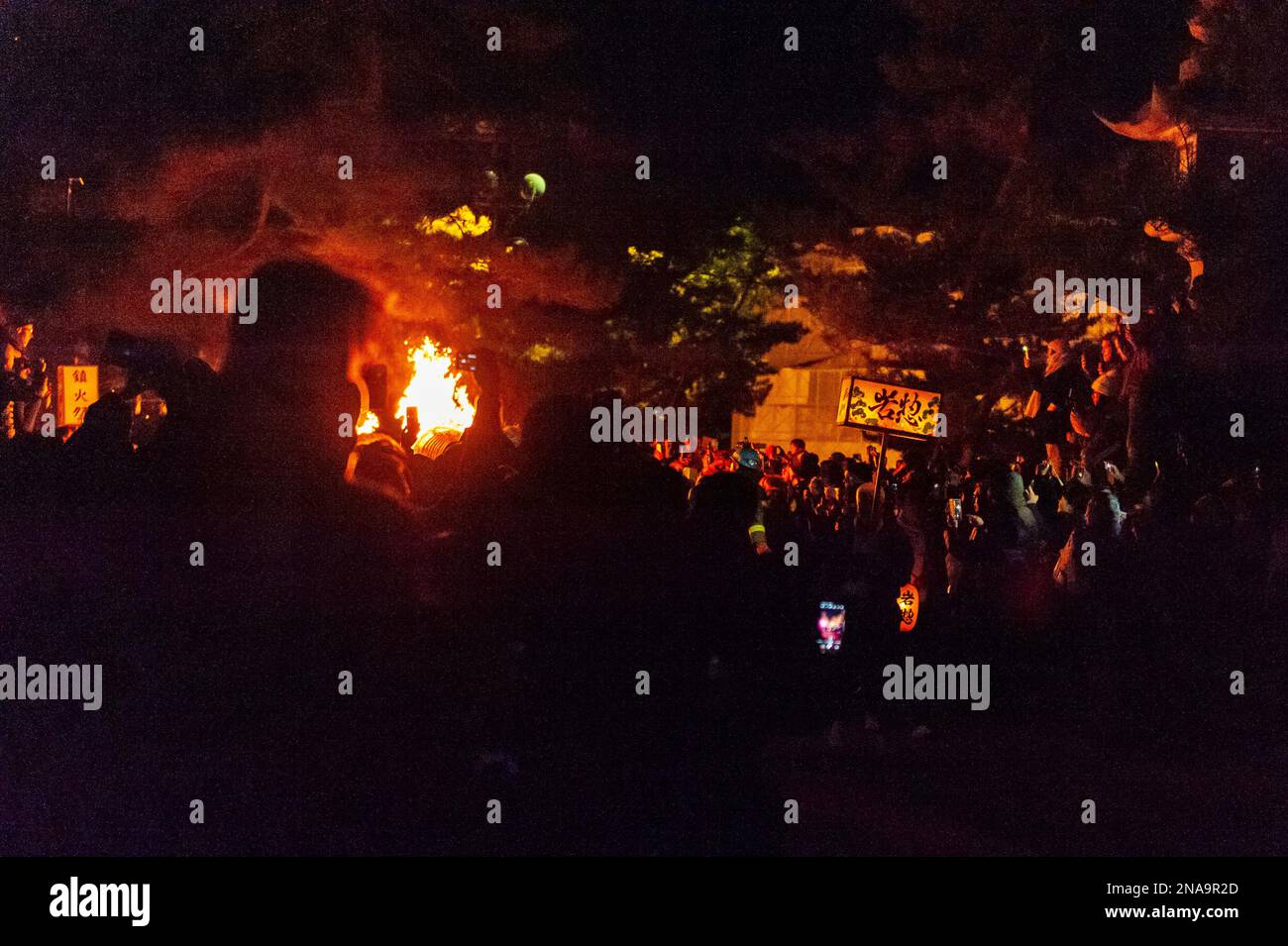 Miyajima, Japan - December 31, 2019. Participants of the Chinkasai Fire ...