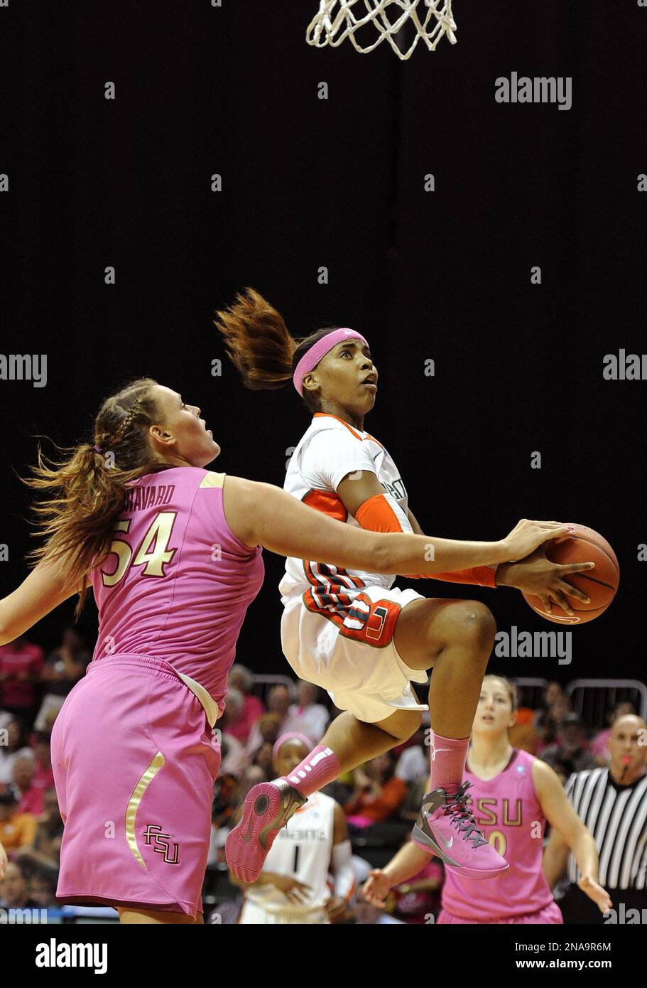 Miami's Suriya McGuire, right, is defended by Florida State's Cierra ...