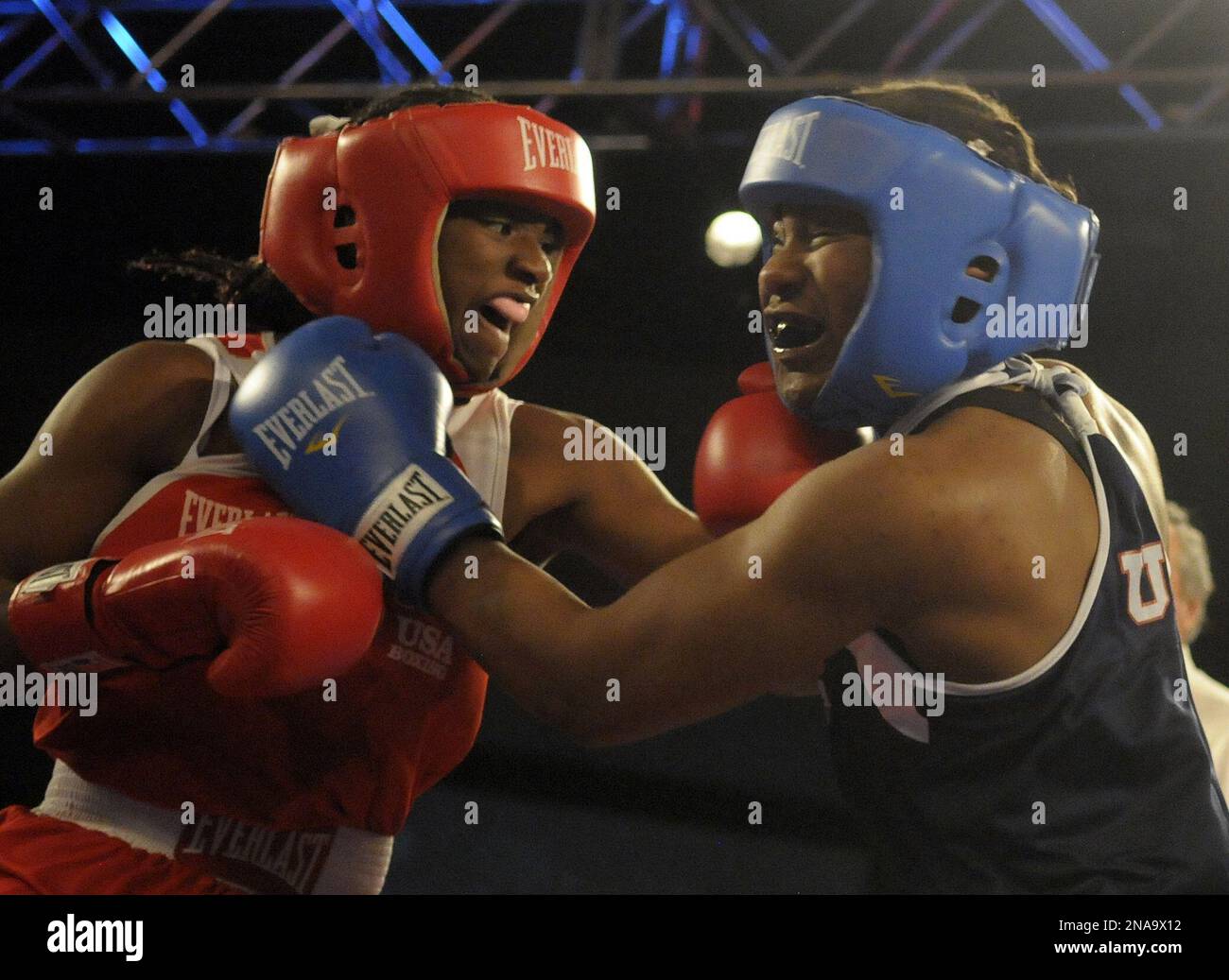 Claressa Shields, left, and Tika Hemingway battle during a middleweight ...