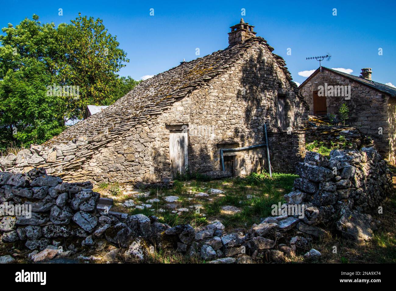 A beautiful shot of old stone houses in Le Jas in Chanac, Lozere ...