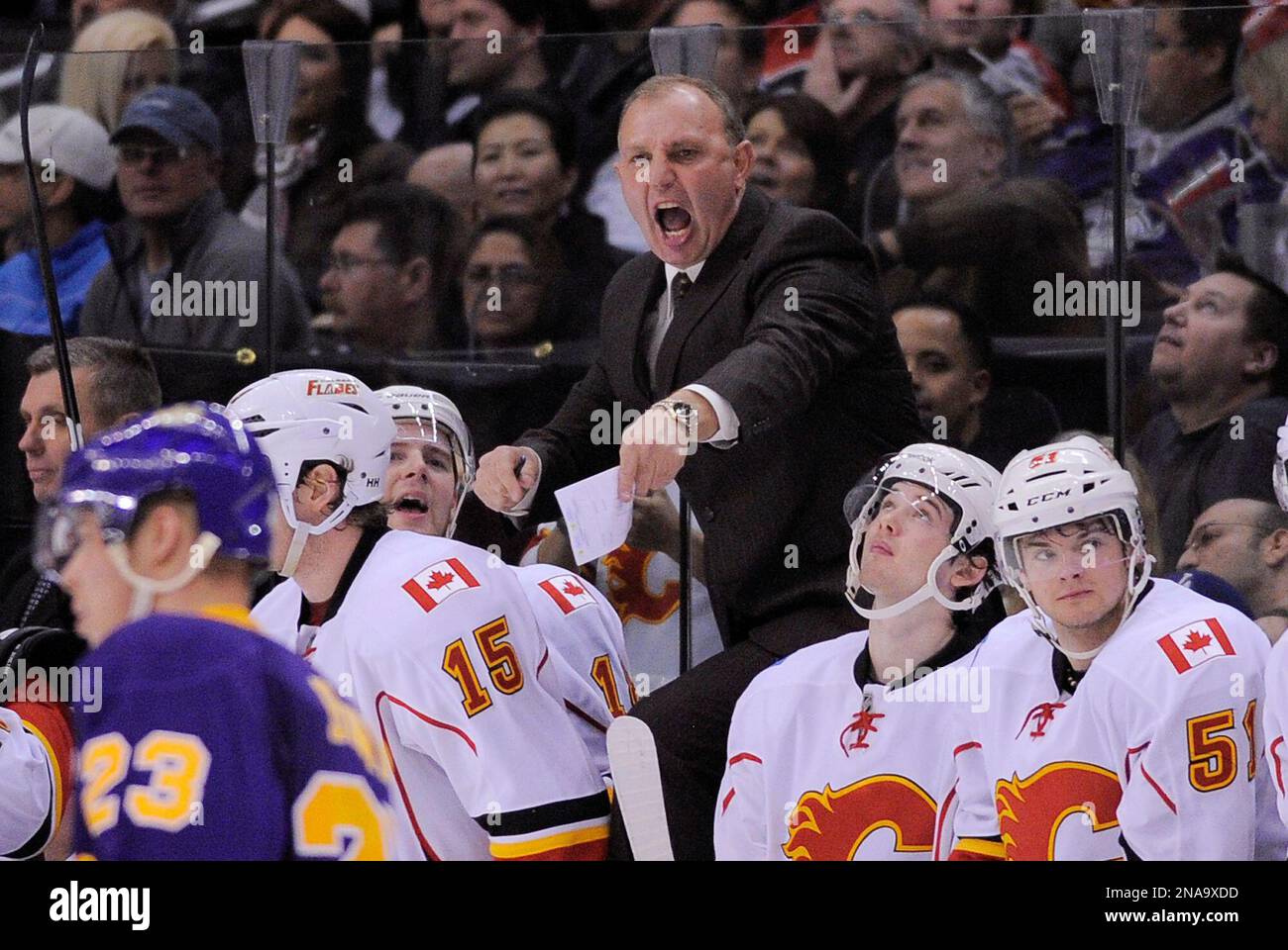 Calgary Flames head coach Brent Sutter yells during the third period of ...