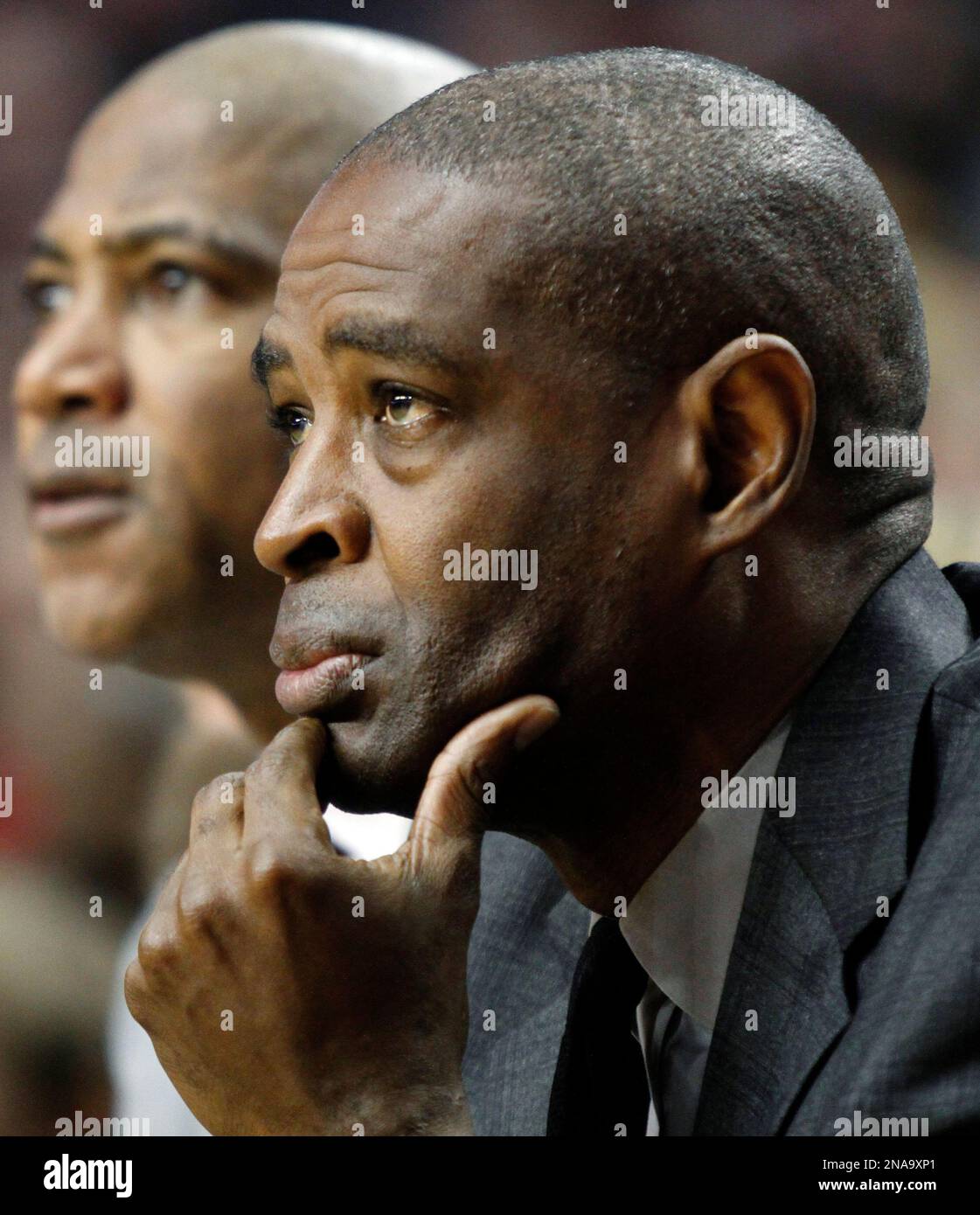 Atlanta Hawks head coach Larry Drew, right, and assistant coach Lester ...