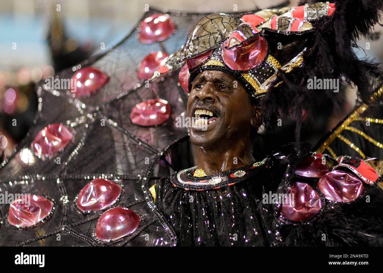 A performer from the Dragoes da Real samba school dances during a ...