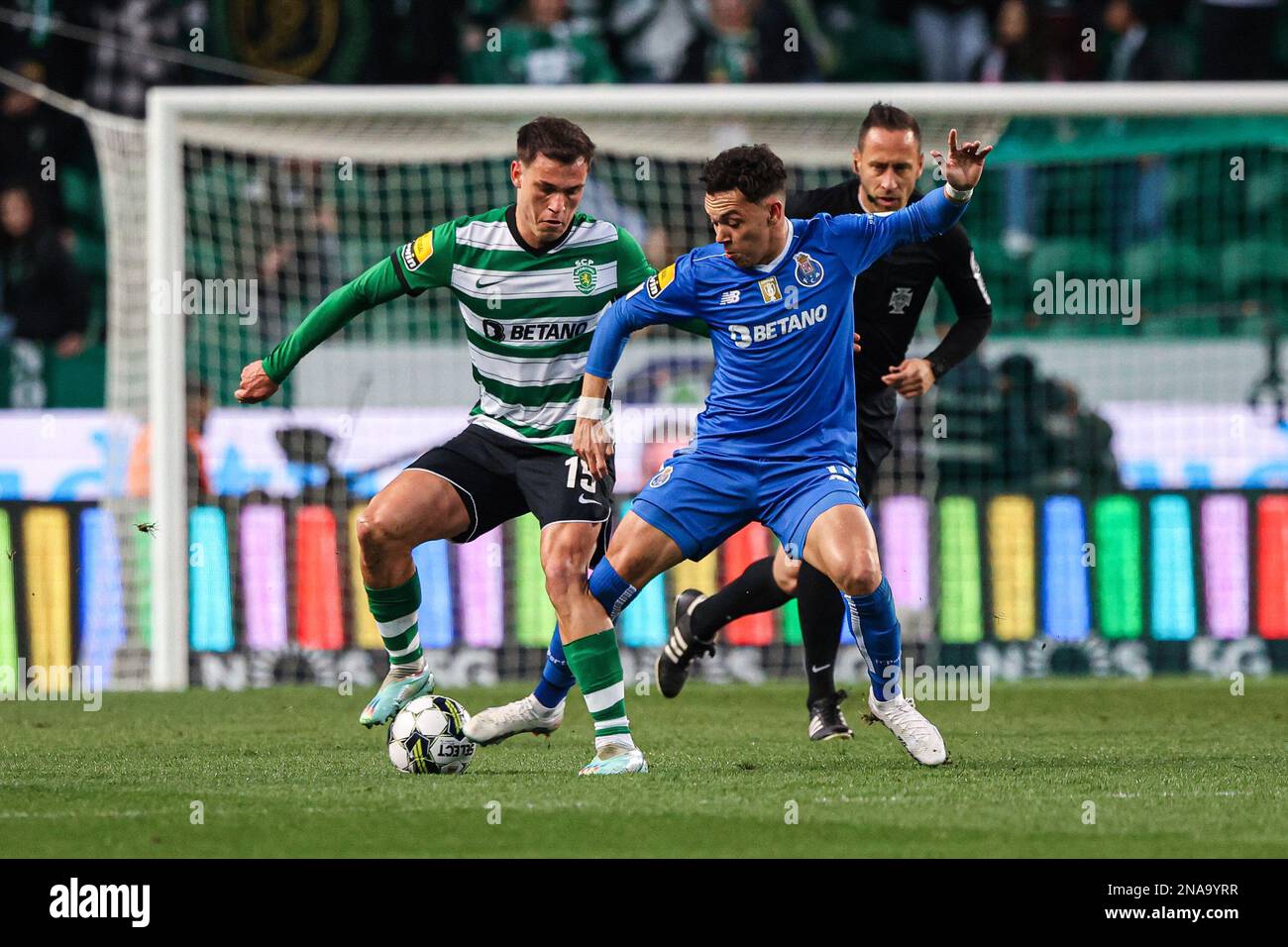 Lisbon, Portugal. 12th Feb, 2023. Manuel Ugarte of Sporting CP (L) with ...