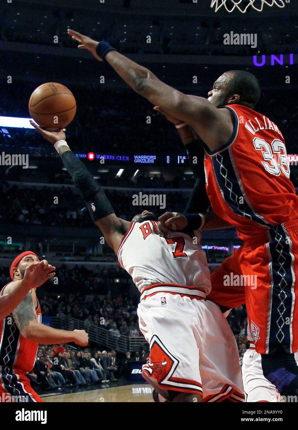New Jersey Nets forward Shelden Williams (33) blocks a shot by Chicago ...