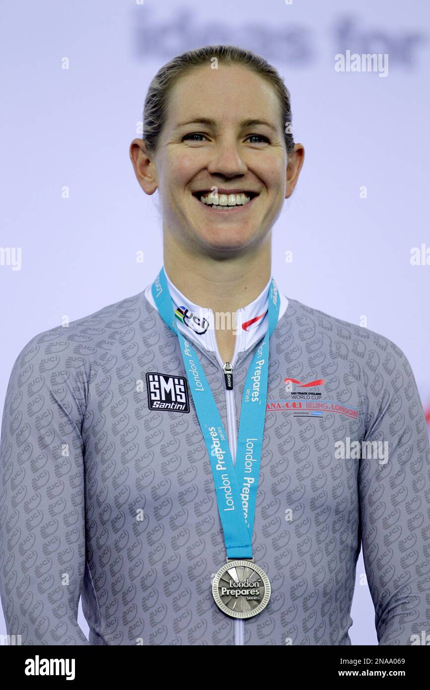 New Zealand's Alison Shanks wears her silver medal after being ...