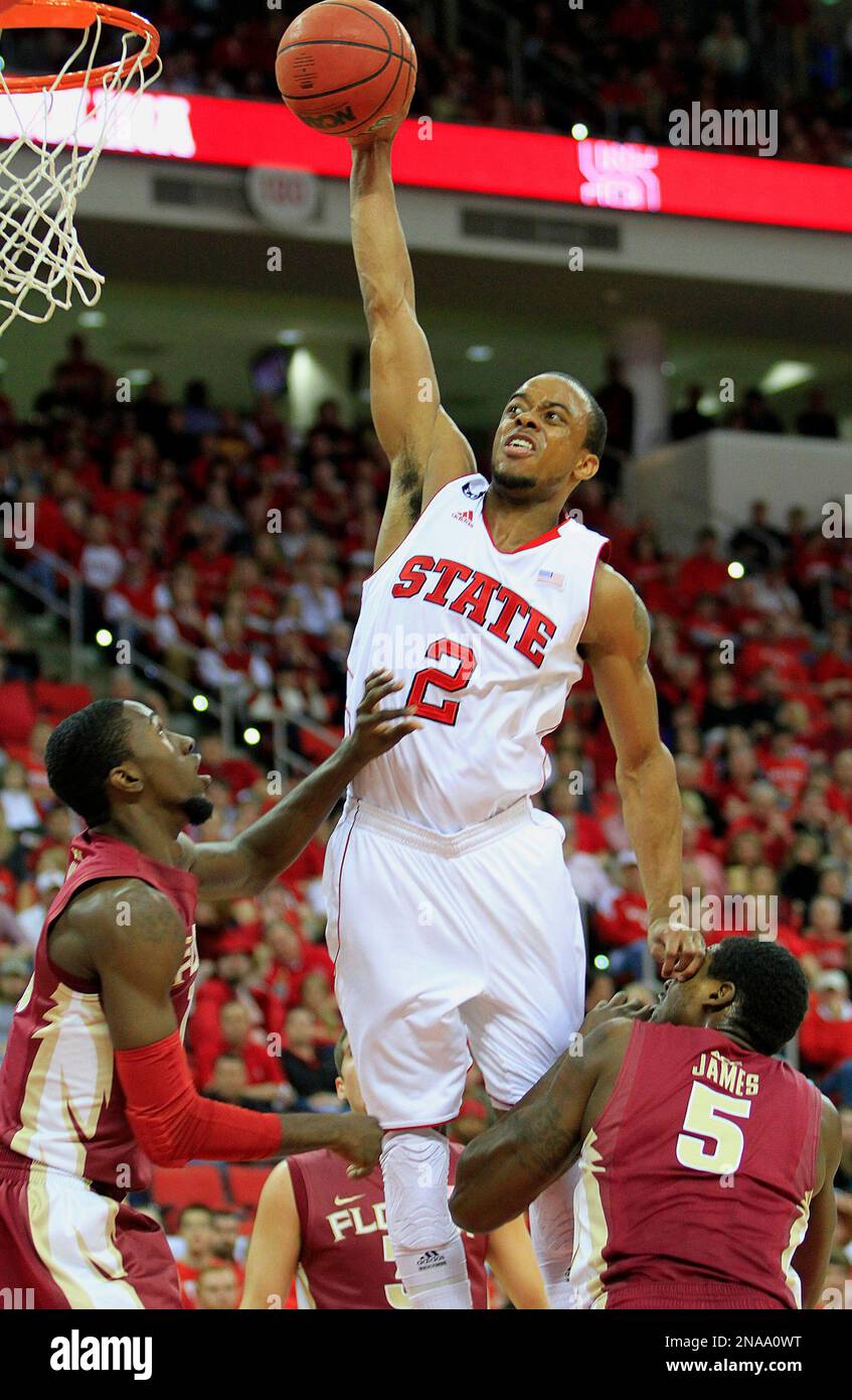 North Carolina State's Lorenzo Brown (2) drives between Florida State's ...