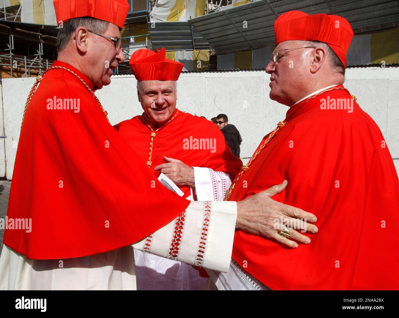 Cardinal Roger Michael Mahony of the United States, left, congratulates ...