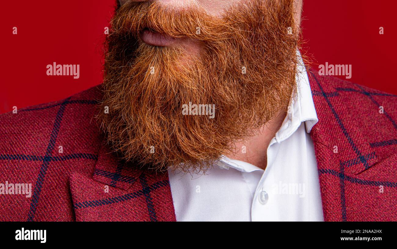 closeup facial photo of unshaven man with mustache on background ...