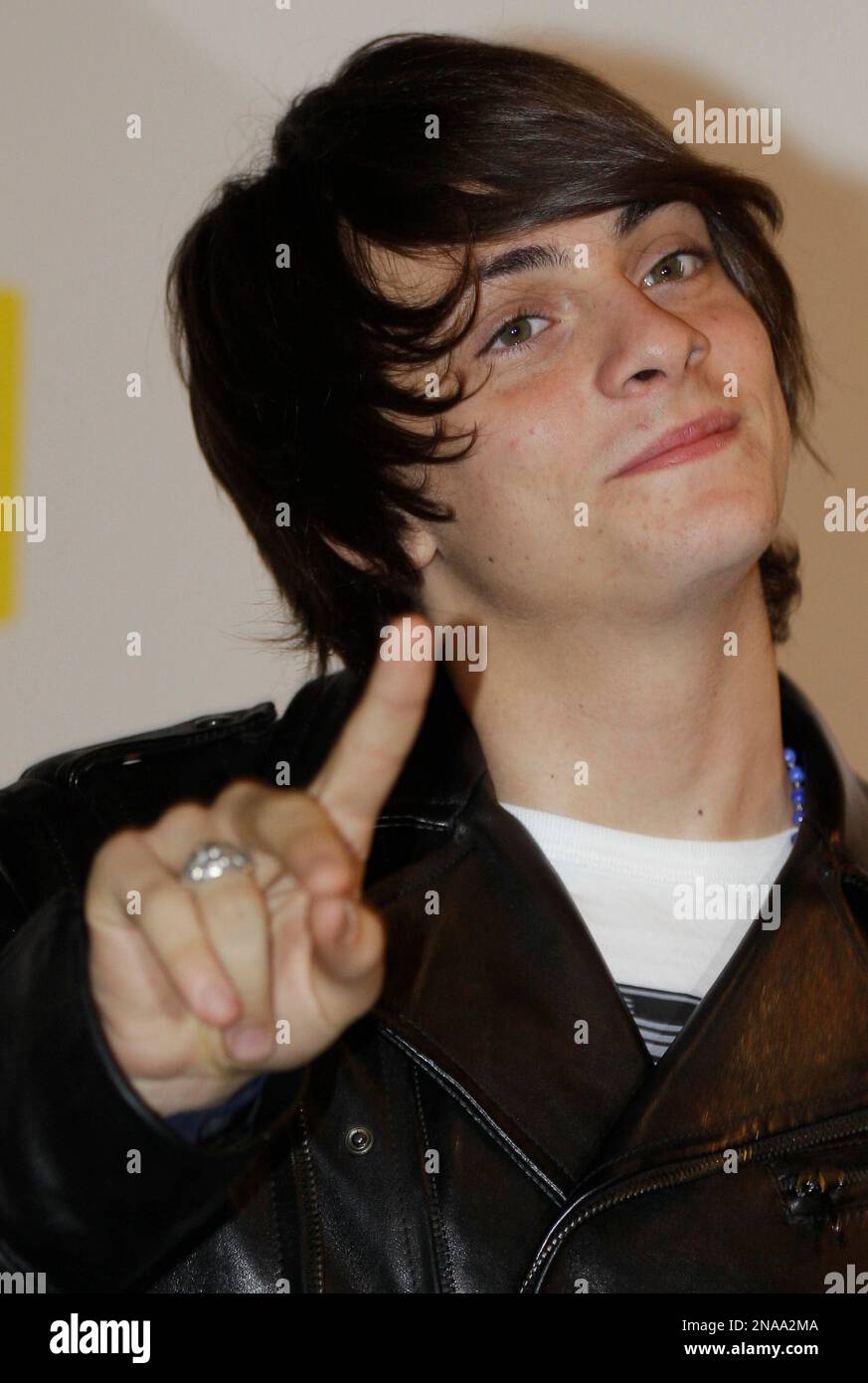 Italian singer Alessandro Casillo gestures as he poses prior to a press ...