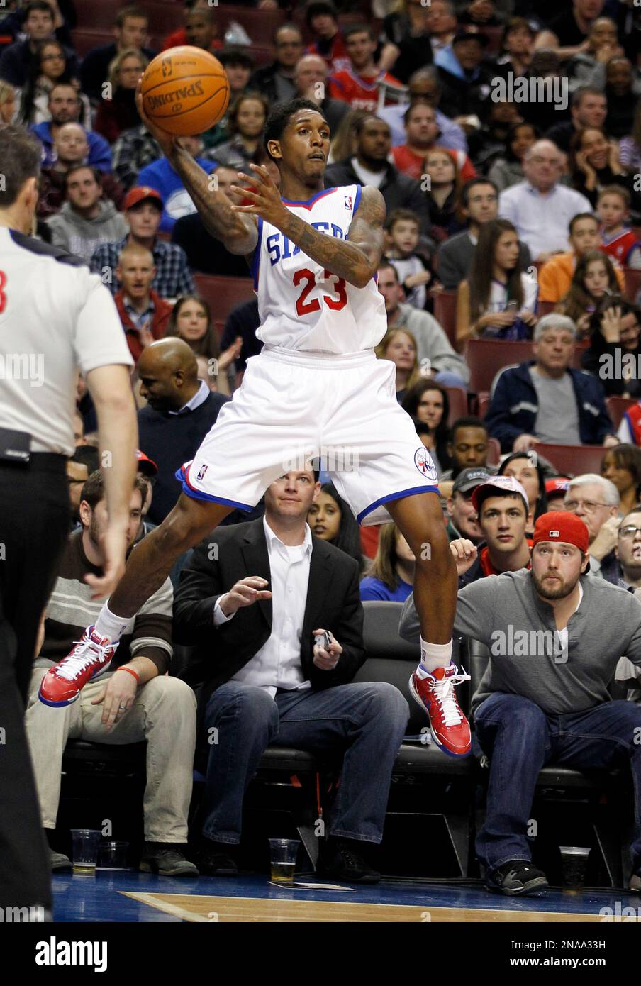Philadelphia 76ers point guard Lou Williams (23) makes a save in the ...