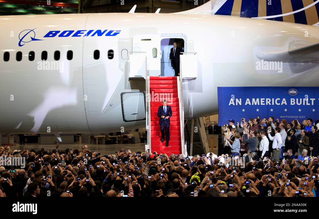 President Barack Obama steps out of a Boeing 787 after touring the ...